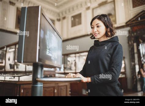 Woman Use Interactive Modern Monitor In Museum Educational Technologies Concept Stock Photo Alamy
