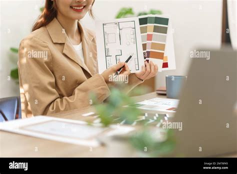 Architectural Concept Female Architect Presenting House Interior Design To Client On Video Call