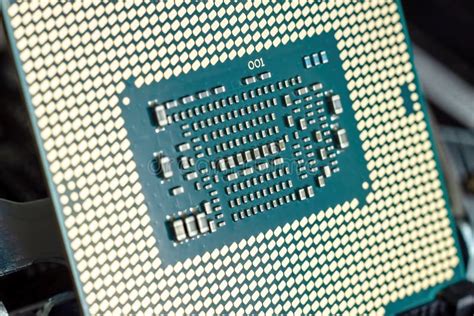 Engineer Plugging Cpu Microprocessor To Motherboard Socket Computer Technology And Hardware