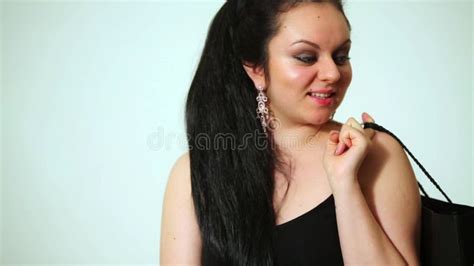 Dark Haired Girl Model With Black Bag Poses At Stock Video Video Of