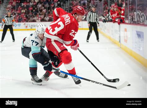 Seattle Kraken Center Berkly Catton Left And Detroit Red Wings Left