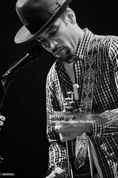 The American Singer And Musician Ben Harper Playing The Guitar During
