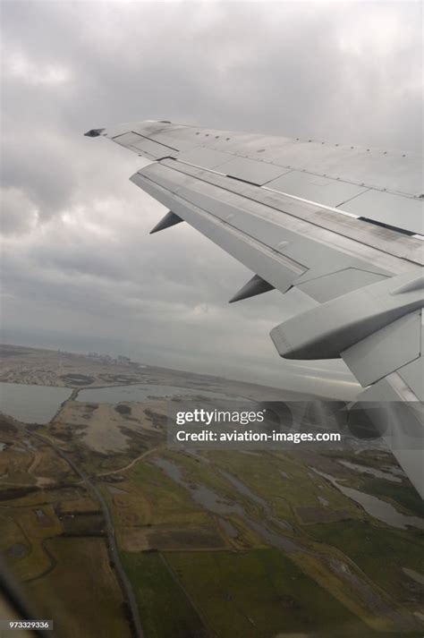 Trailing Edge Wing Flaps And Wing Of A Titan Airways Boeing 737 300