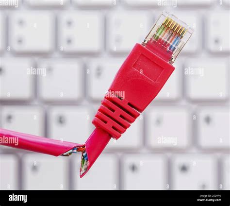Defective Network Cable On Keyboard Symbolic Photo For Online