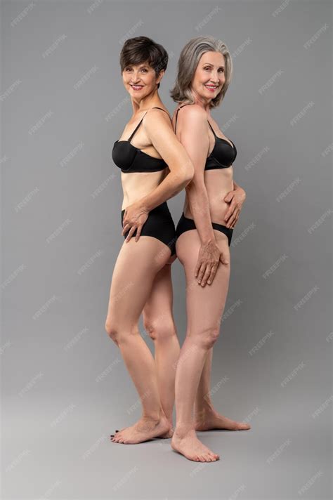 Premium Photo Senior Woman In Black Lingerie Feeling Good And Smiling