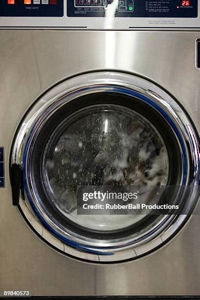 Washing Machine Soap Bubbles Photos And Premium High Res Pictures