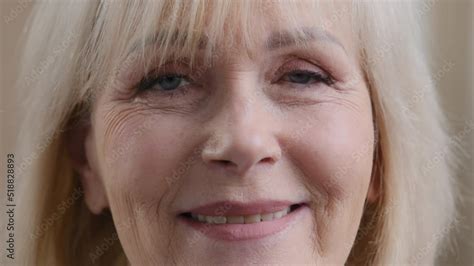Extreme Close Up Caucasians 60s Woman 50s Mother Smiling Sincerely
