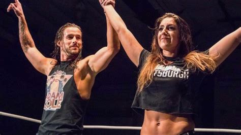 Britt Baker And Adam Cole Proudly Pose With The Aew Womens Title