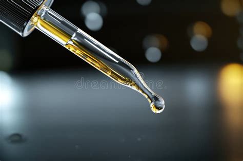 A Close Up Shot Of A Single Drop Of Liquid On A Surface Stock Image