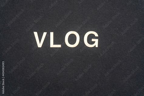 Vlog Word Written On Dark Paper Background Vlog Text For Your Concepts Stock Photo Adobe Stock