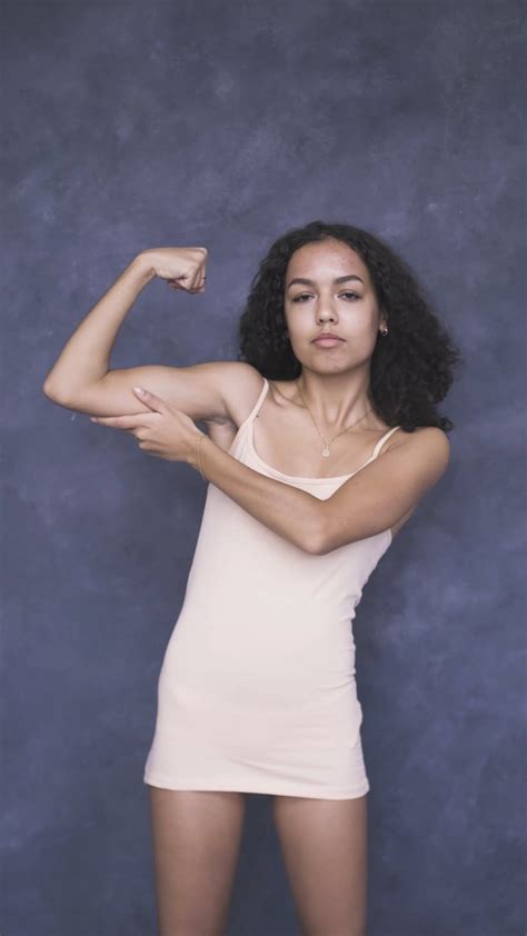 A Skinny Girl Showing Her Muscles Free Stock Video Footage Royalty