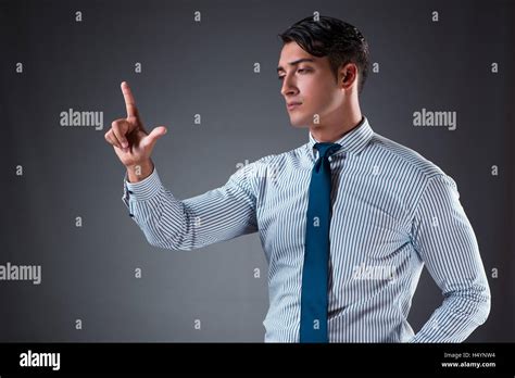 Handsome Businessman Pressing Virtual Buttons Stock Photo Alamy