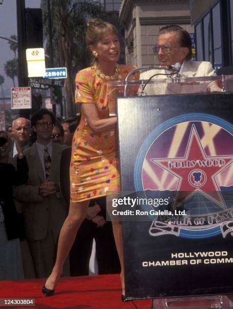 Actress Mary Tyler Moore And Actor Morey Amsterdam Attend The News