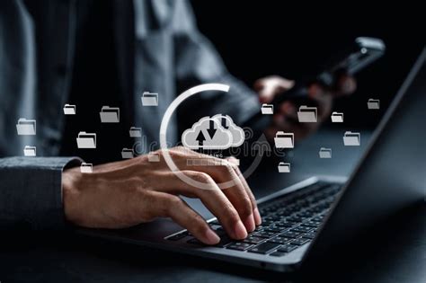 Businessman Using Smartphone And Laptop Uploading To Cloud Computing To Download And Loading