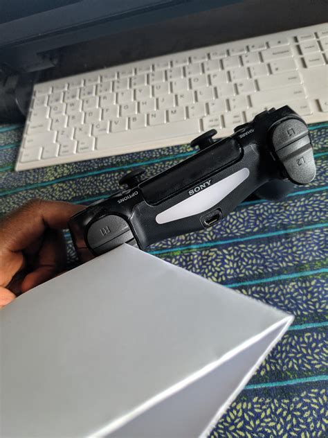 The PS4 R2 Trigger Is So Sensitive I Need Only Slide A Twice Folded Piece Of Paper In Between