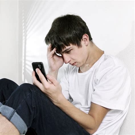 Sad Teenager With Cellphone Stock Image Image Of Mobile Couch 47990679