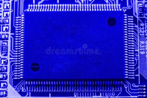 Integrated Semiconductor Microchip On Blue Circuit Board Representative Of The High Tech