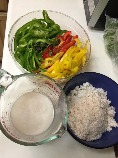 Premium Photo Sliced Vegetables And Rice In Bowls