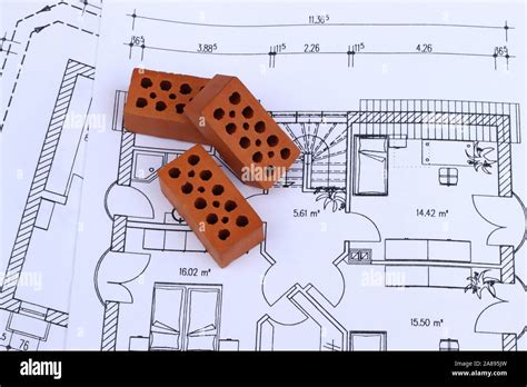 Part Of A Construction Plan Or Blueprint For A Residential Building With Three Small Brick