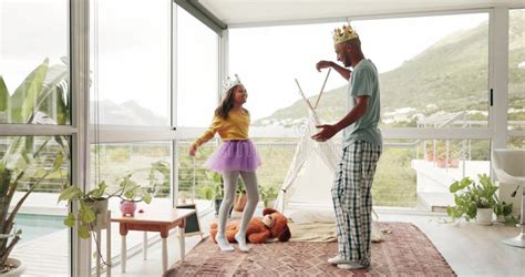 Fantasy Dance And A Dad With His Daughter For Fun While Playing Together As King And Princess
