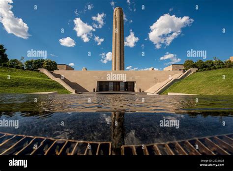 Majestic Monument With Reflective Pool Under Bright Blue Sky Stock