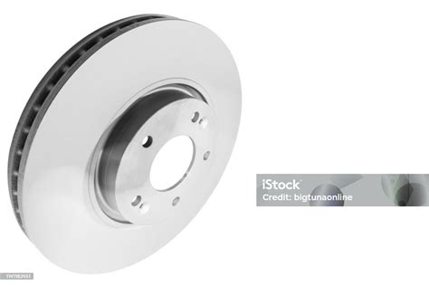 흰색 배경에 고립 된 브레이크 디스크 자동차 부품 브레이크 디스크로 터는 흰색 절연 제동 디스크 자동차 부품입니다 자동차 세부 예비 부품 흑백 강철에 대한 스톡 사진 및