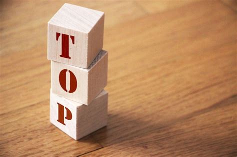 Premium Photo Top Word On Of Wooden Cubes With The Letters Stack Of Cubes Put Vertically On
