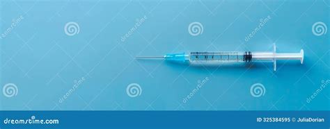 Syringe With Botox With Blue Background Space For Text Beauty Procedure Concept Royalty Free