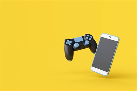노란색 배경에 게임 패드와 전화를 날리고 있습니다 크리에이티브 미니멀 게임 컨셉 3d 렌더링 전자 산업에 대한 스톡 사진 및 기타 이미지 Istock