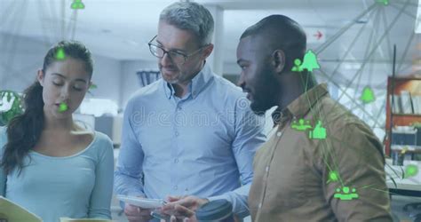 Animation Of Globe With Network Of Connections Over Diverse Business People In Office Stock