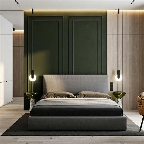 Современная спальня с темно зелеными стенами и деревянной панелью на стене