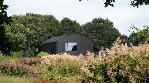Sandy Rendel Architects Converts Barrel Vaulted Barn Into Home