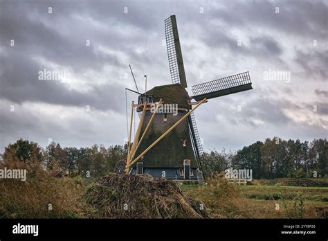 The Loenderveense Polder Mill A Historic Drainage Windmill With Its