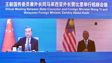 Глава МИД КНР Ван И провел по видеосвязи встречу с министром иностранных дел Малайзии Cgtn на