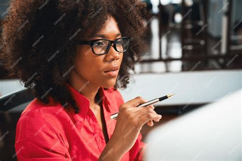 Premium Photo Portrait Of Young African Woman Creating Website