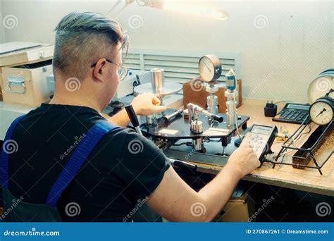 Professional Calibration Of Pressure Gauges And Sensors Working Man Is Engaged In Verification