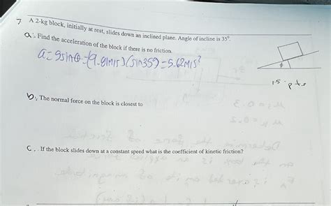 solved a 2 kg block initially at rest slides down an