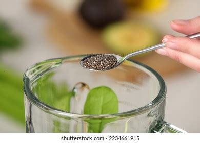 Woman Adding Chia Seeds Into Blender Stock Photo Shutterstock