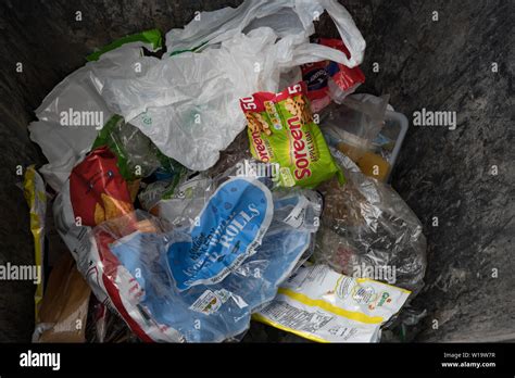 Rubbish Mailny Non Recyclable Plastic Food Packaging In Household Bin