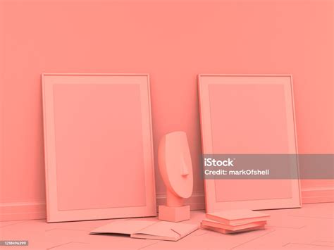 책과 펜이 있는 단색 단일 분홍색 색상의 방 3d 렌더링 측면 보기로 바닥에 2개의 수직 빈 포스터 프레임 0명에 대한 스톡 사진 및 기타 이미지 Istock