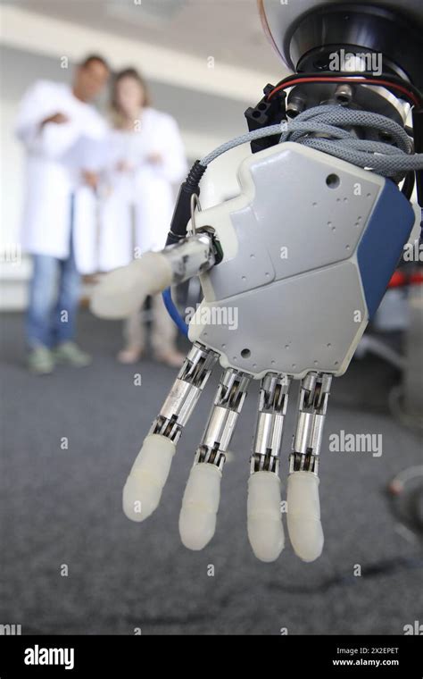 Humanoid Robot For Automotive Assembly Tasks In Collaboration With People And And Lwr Robot