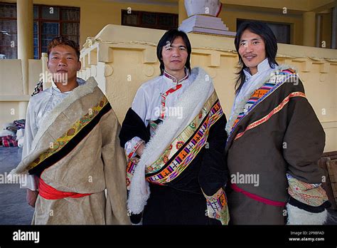 Tibetan Wearing Typical Dress In Namgyal Monasteryin Tsuglagkhang