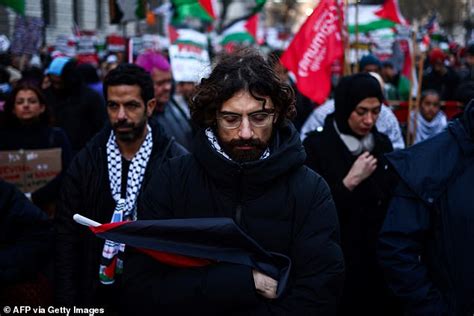 Met Police Hunt Protester Carrying Final Solution Placard Comparing