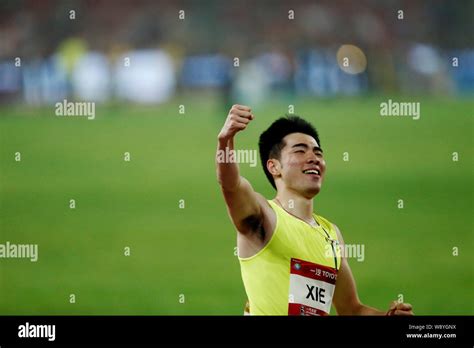 Xie Wenjun Of China Celebrates After Winning The Mens 110m Hurdles