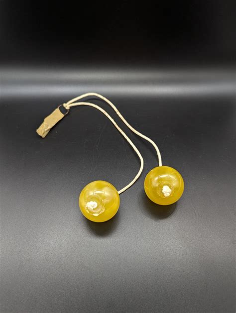 Vintage 1970s Acrylic Clackers Lightly Marbled Yellow Retro Toy