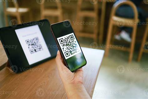 Qr Code Payment Woman Scanning QR Code Online Shopping Cashless Technology Concept 27107523