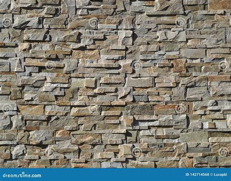 Exterior Wall Cladding Made Of Natural Stones With Irregular Shapes