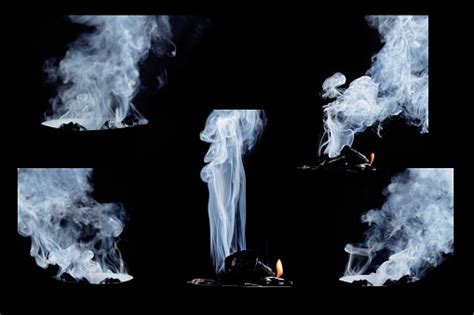 섬세하게 솟아오르는 추상적인 연기의 다섯 줄기가 미니멀한 어두운 배경에 비춰집니다 움직임과 우아함을 포착하는 시각 효과 유기적 형태 0명에 대한 스톡 사진 및 기타 이미지