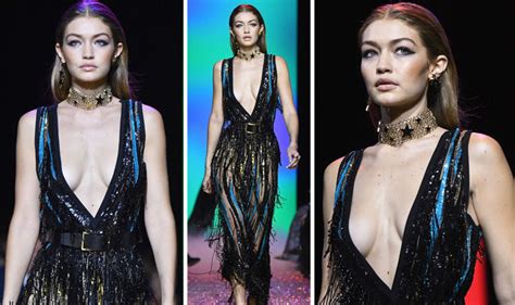 Gigi Hadid Puts On Jaw Dropping Display As She Flaunts Bust In Dangerously Low Cut Dress