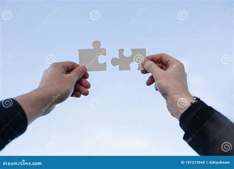 Two 2 Hands Trying To Connect Couple Puzzle Piece Stock Photo Image